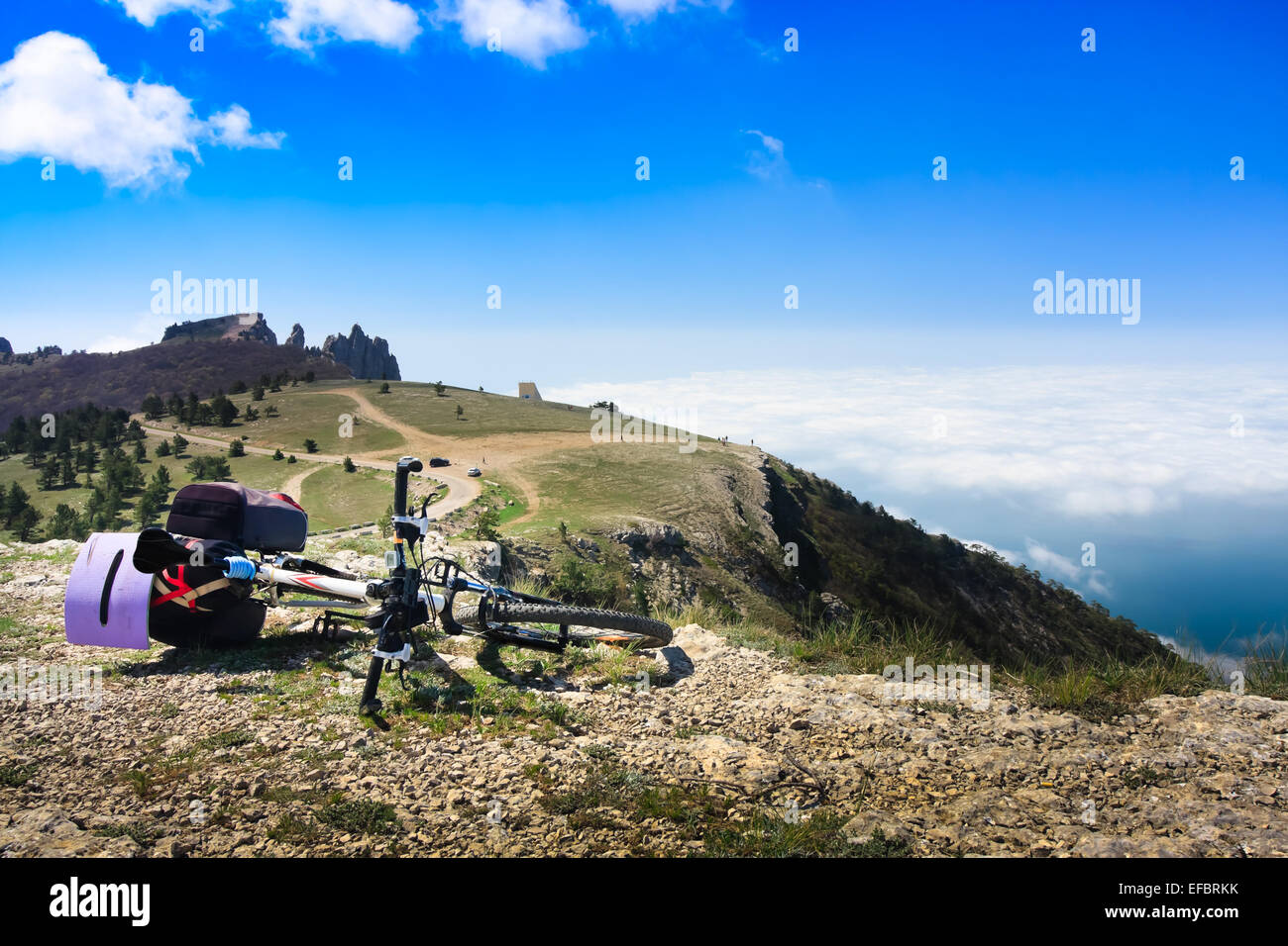 Bike over the precipice Stock Photo - Alamy