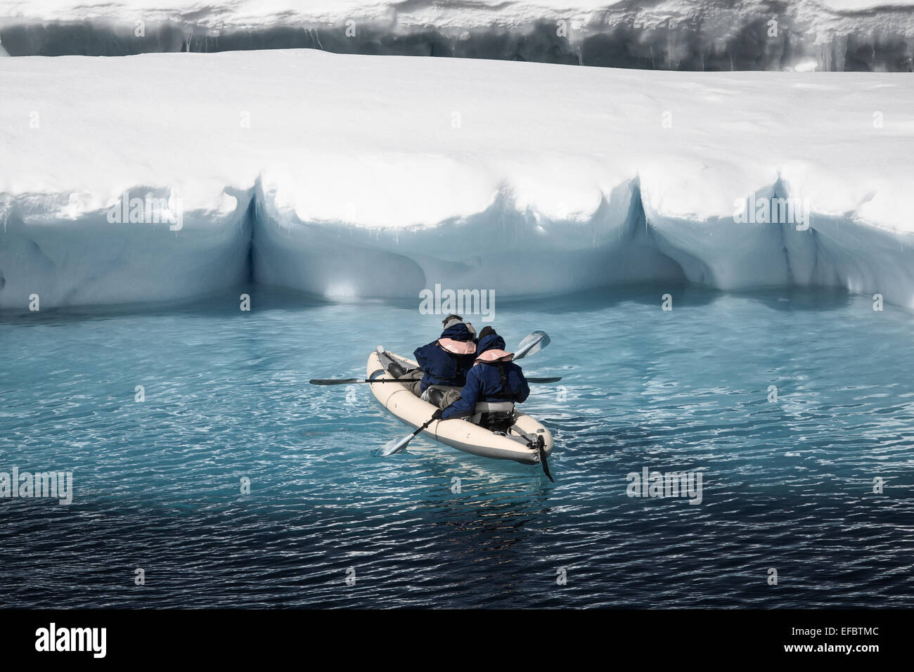 Two men in a canoe Stock Photo - Alamy
