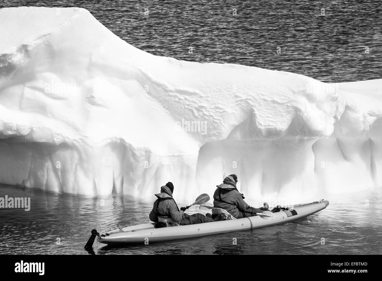 Two men in a canoe Stock Photo - Alamy