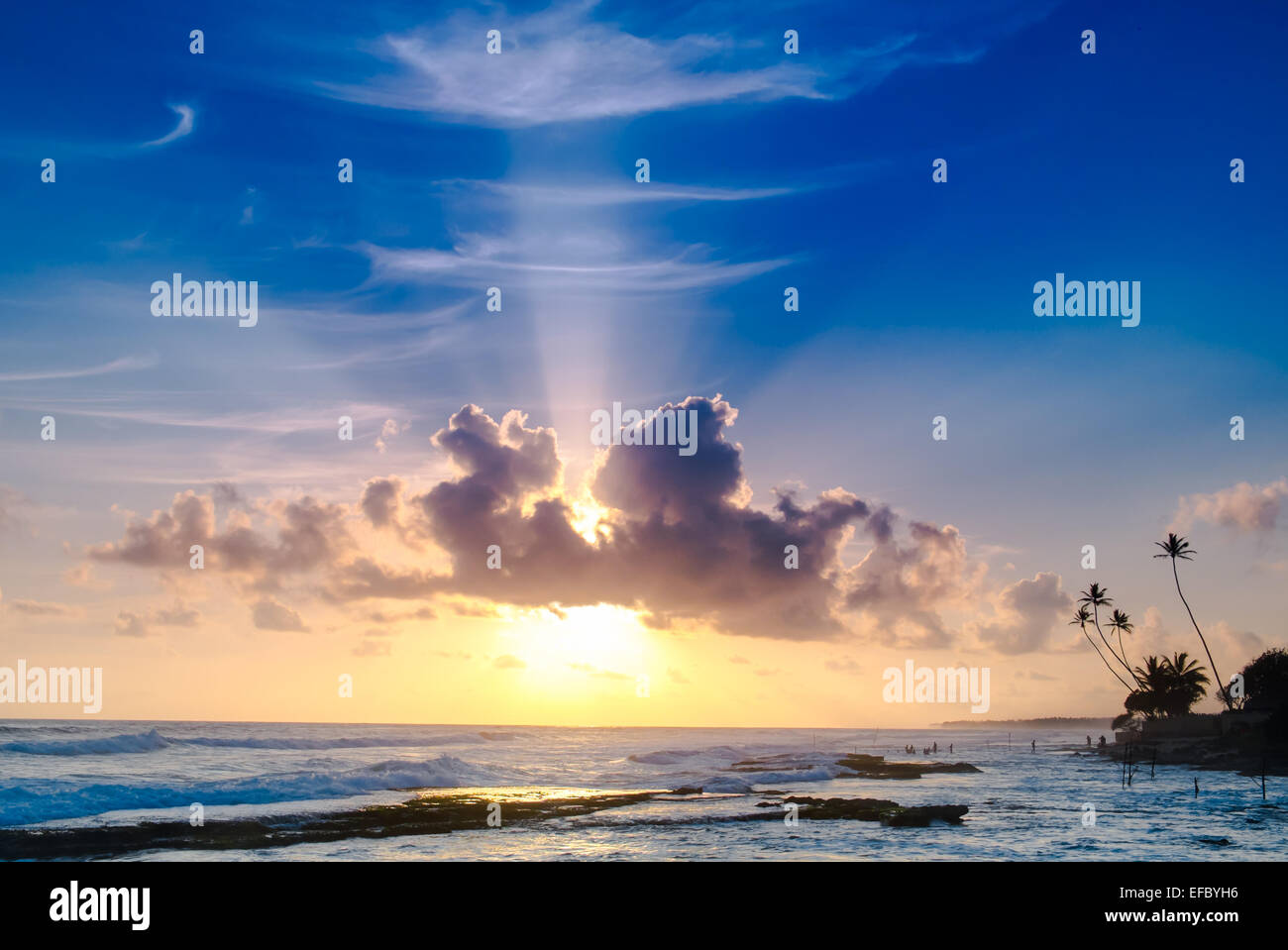 Sunset. blue sky and clouds Stock Photo - Alamy