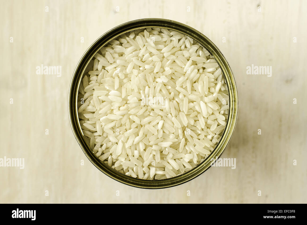 Canned long grain rice in a tin. Concept Stock Photo - Alamy