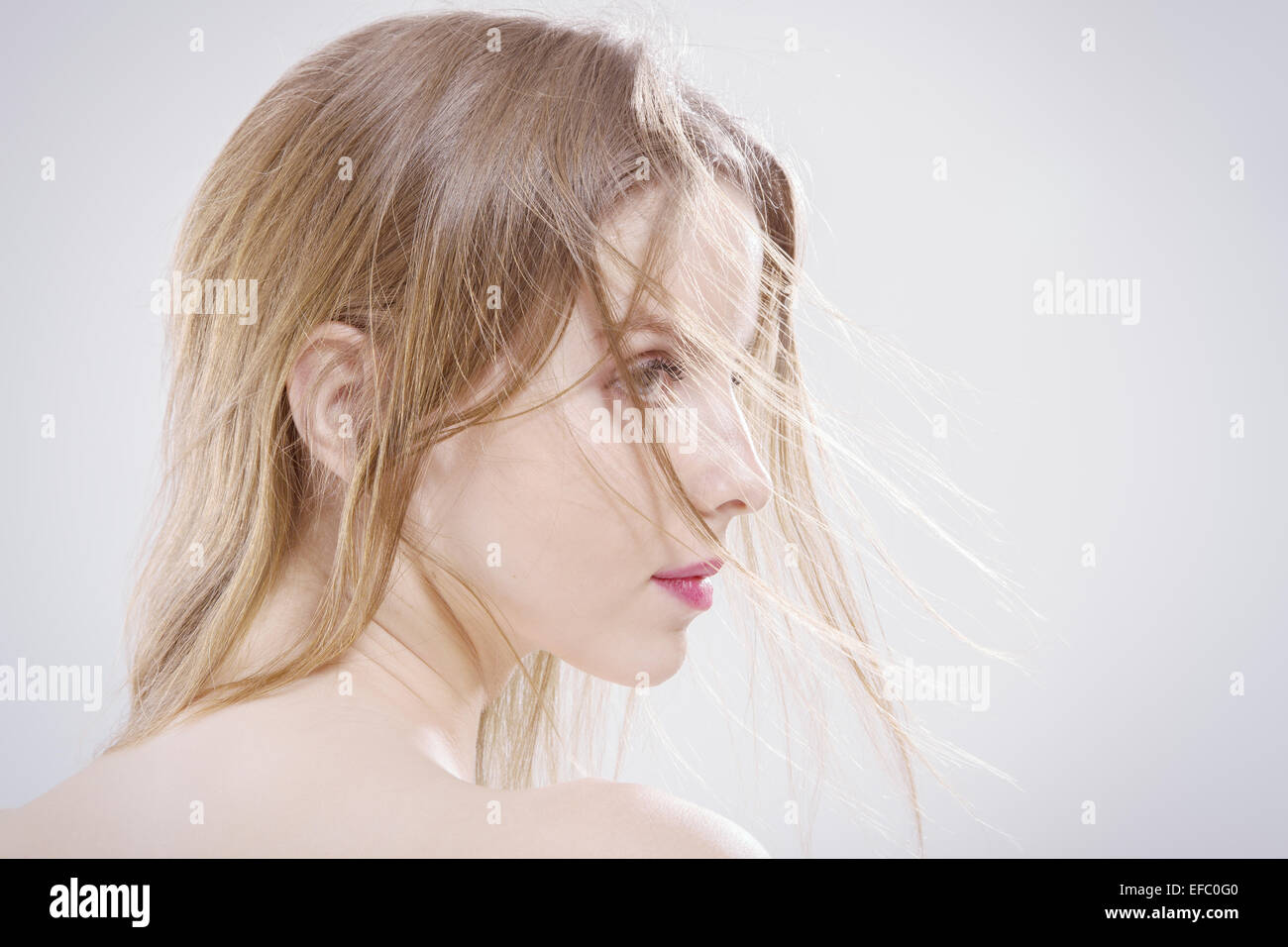 sad young woman profile Stock Photo - Alamy