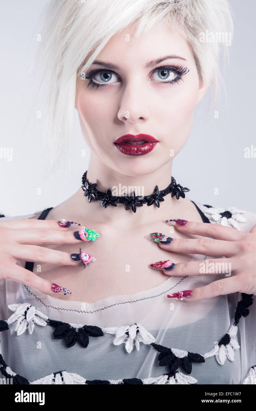Young model with nail design Stock Photo - Alamy