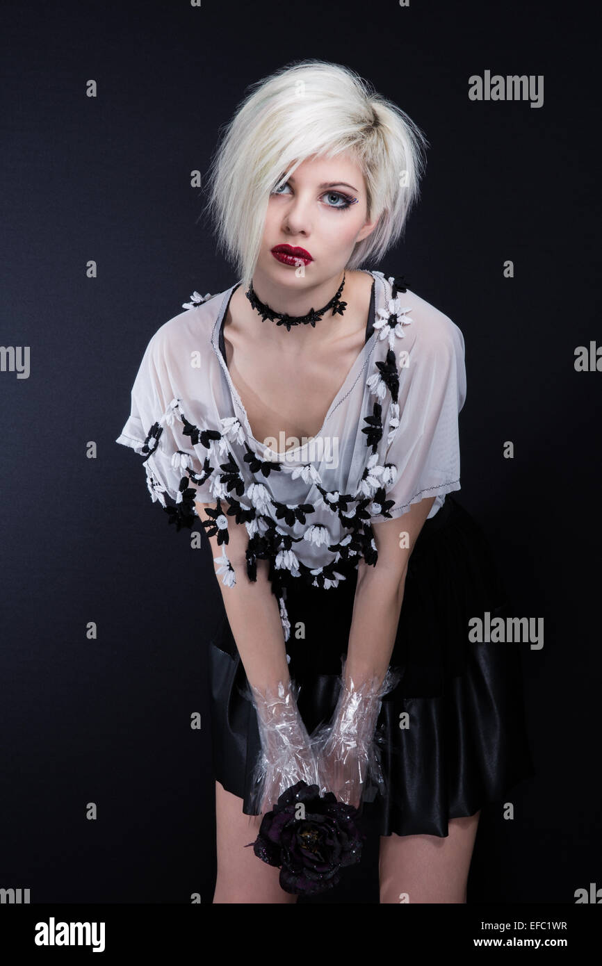 Rock chick with a rose Stock Photo - Alamy