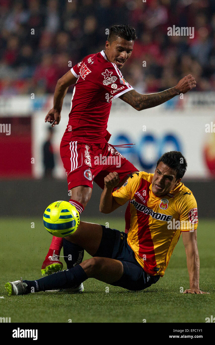 Tijuana, Mexico. 30th Jan, 2015. Xolos' Richard Ruiz (L) vies with ...