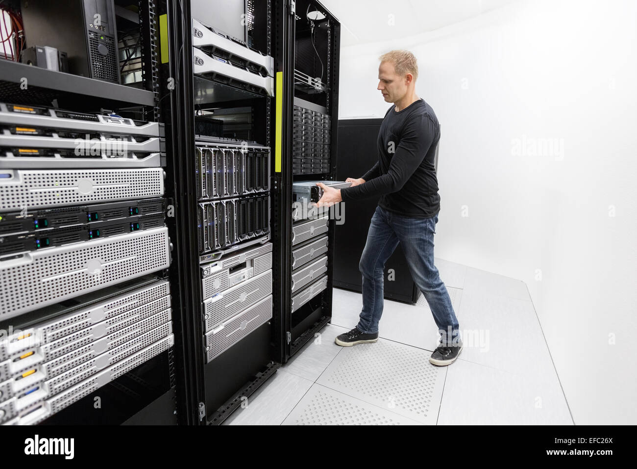 It professional install rack server in datacenter Stock Photo - Alamy