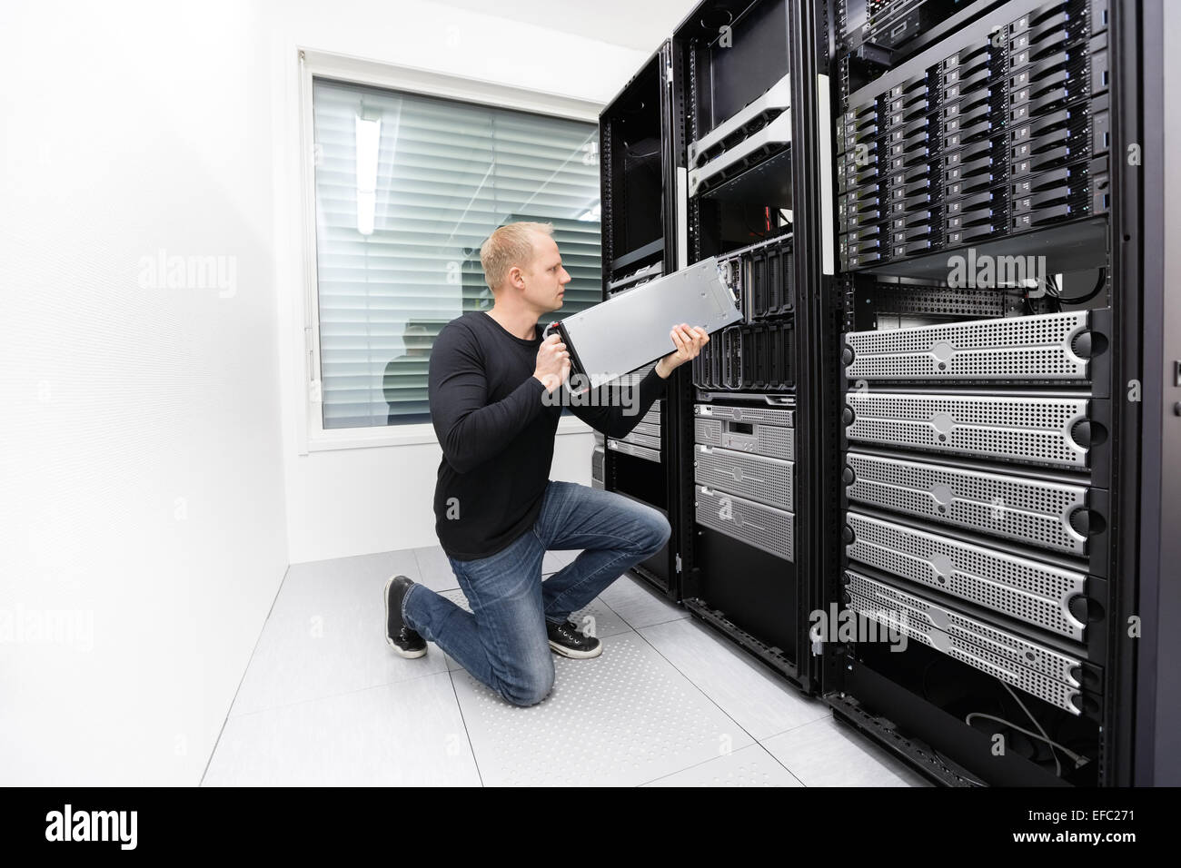 It Technician Replace Blade Server In Datacenter Stock Photo Alamy