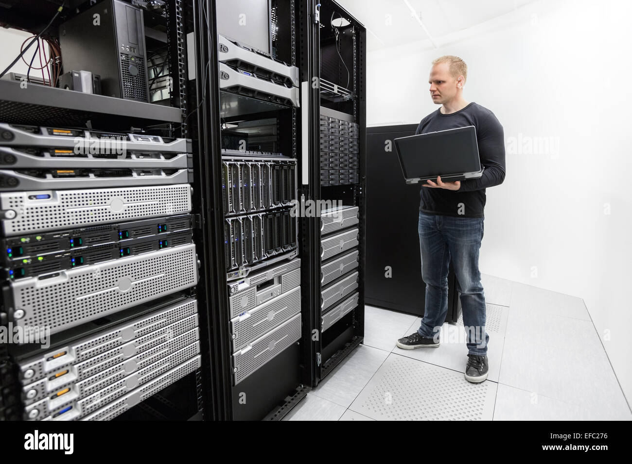 It technician monitors data center Stock Photo - Alamy