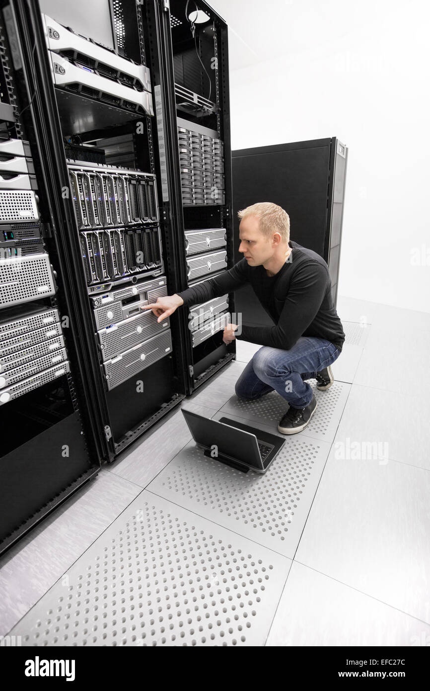 It engineer working in datacenter Stock Photo - Alamy