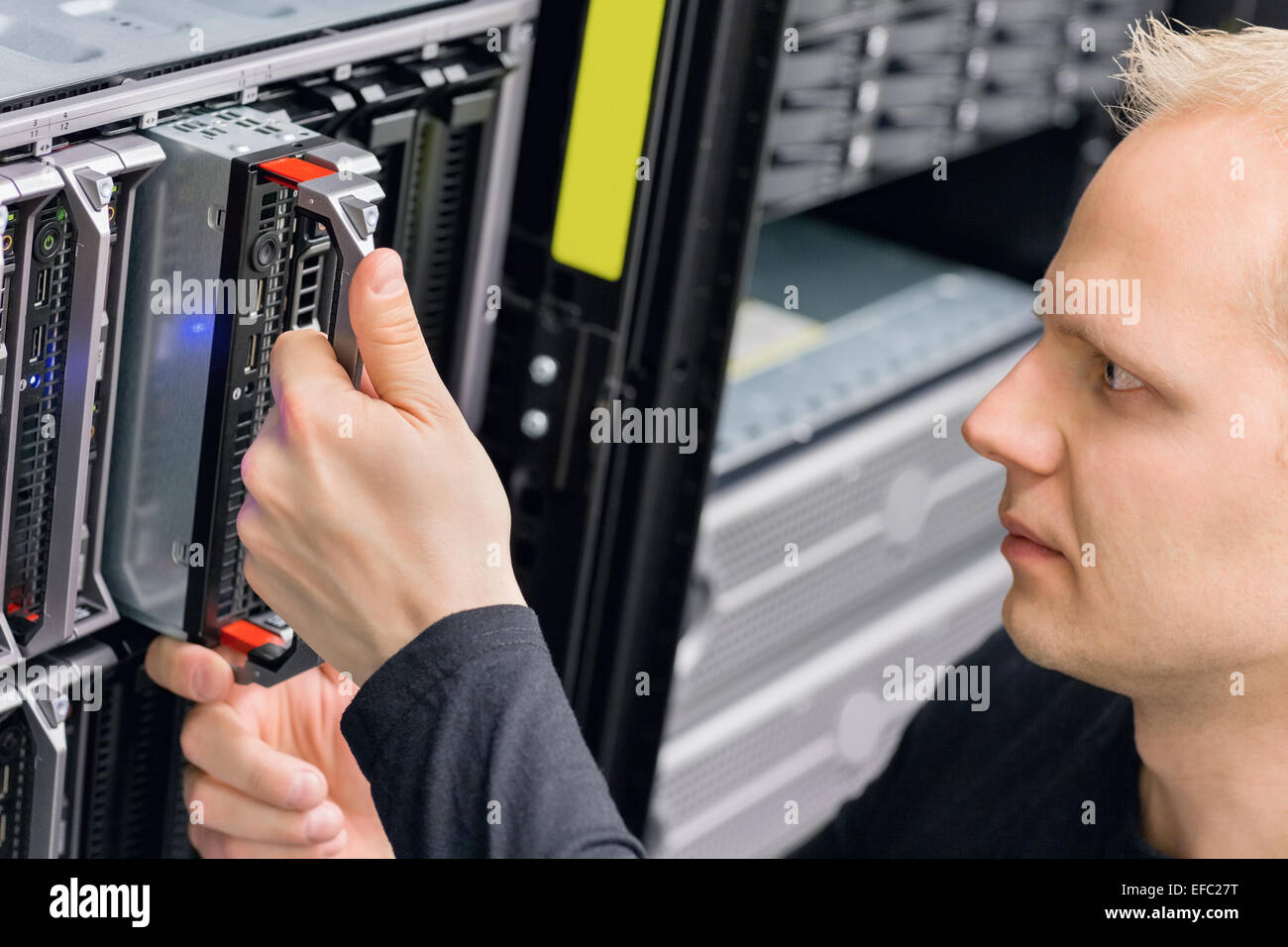 It Consultant Install Blade Server In Datacenter Stock Photo Alamy