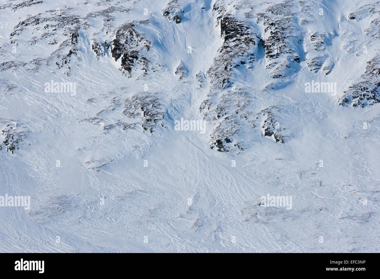 Snowy mountain side Stock Photo - Alamy