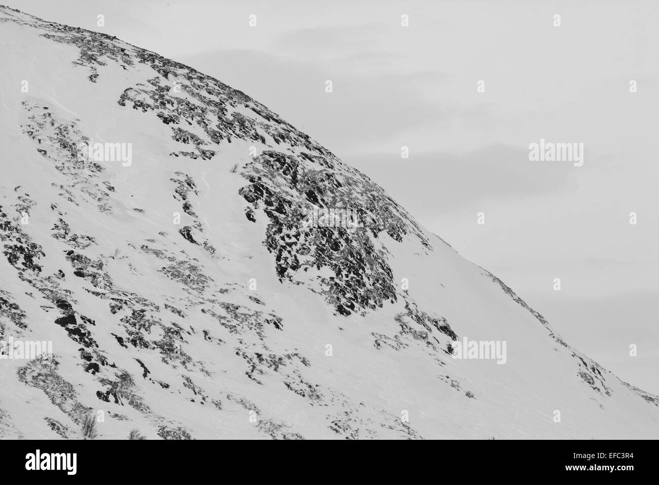 Snowy mountain side Stock Photo - Alamy