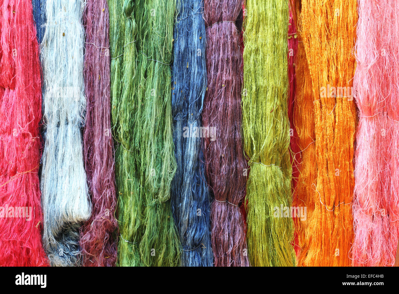 Colorful raw silk thread in the silk farm Stock Photo - Alamy