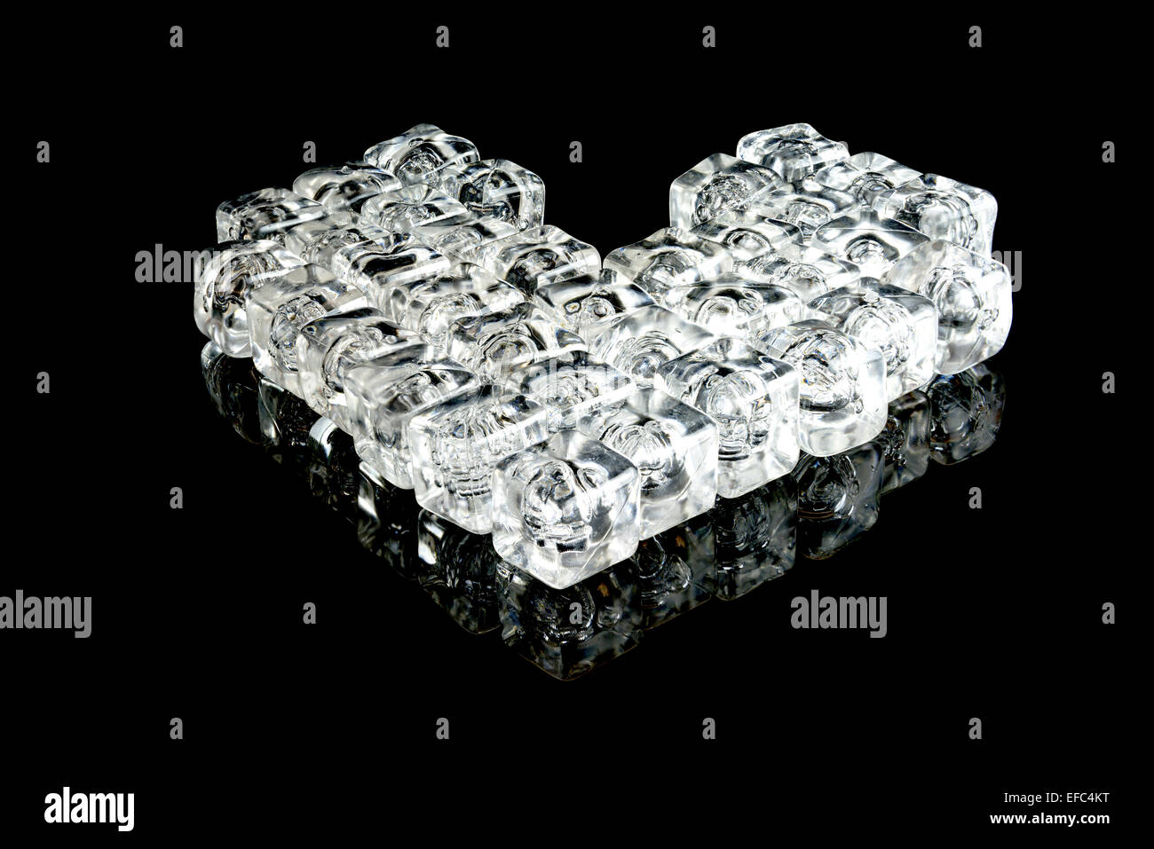 Ice cubes arranged on a black background Stock Photo - Alamy
