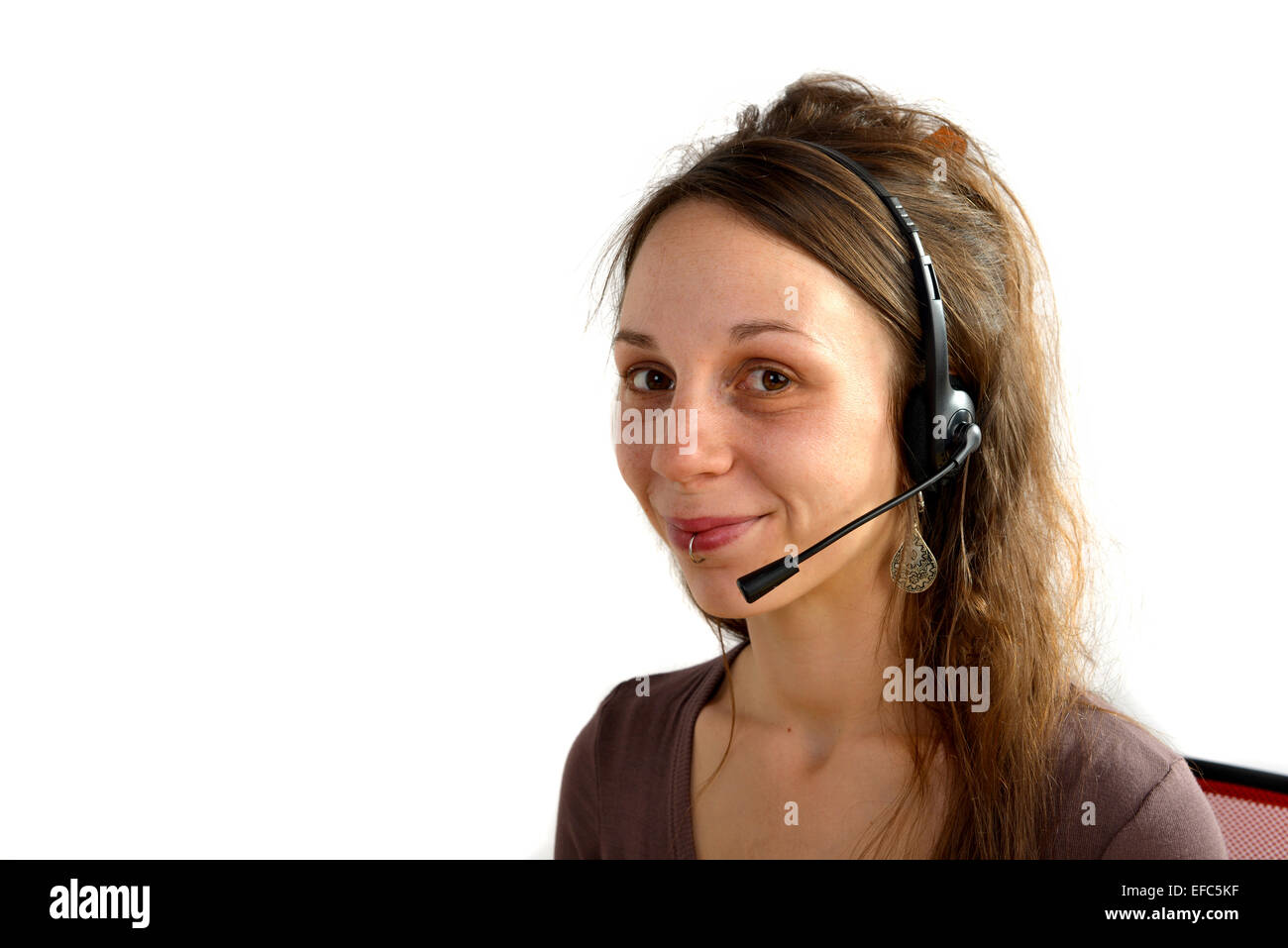 Female customer support operator with headset and smiling Stock Photo - Alamy