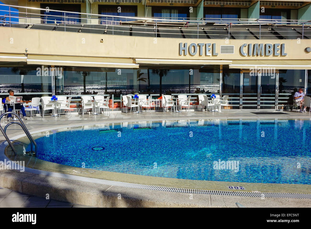 Poolside swimming hi-res stock photography and images - Alamy