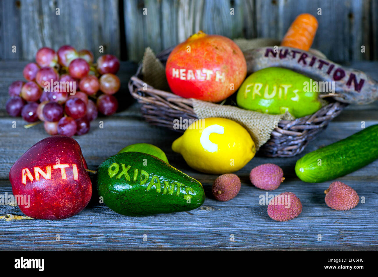 scattered fruits and vegetables with cut words - healthy lifestyle ...