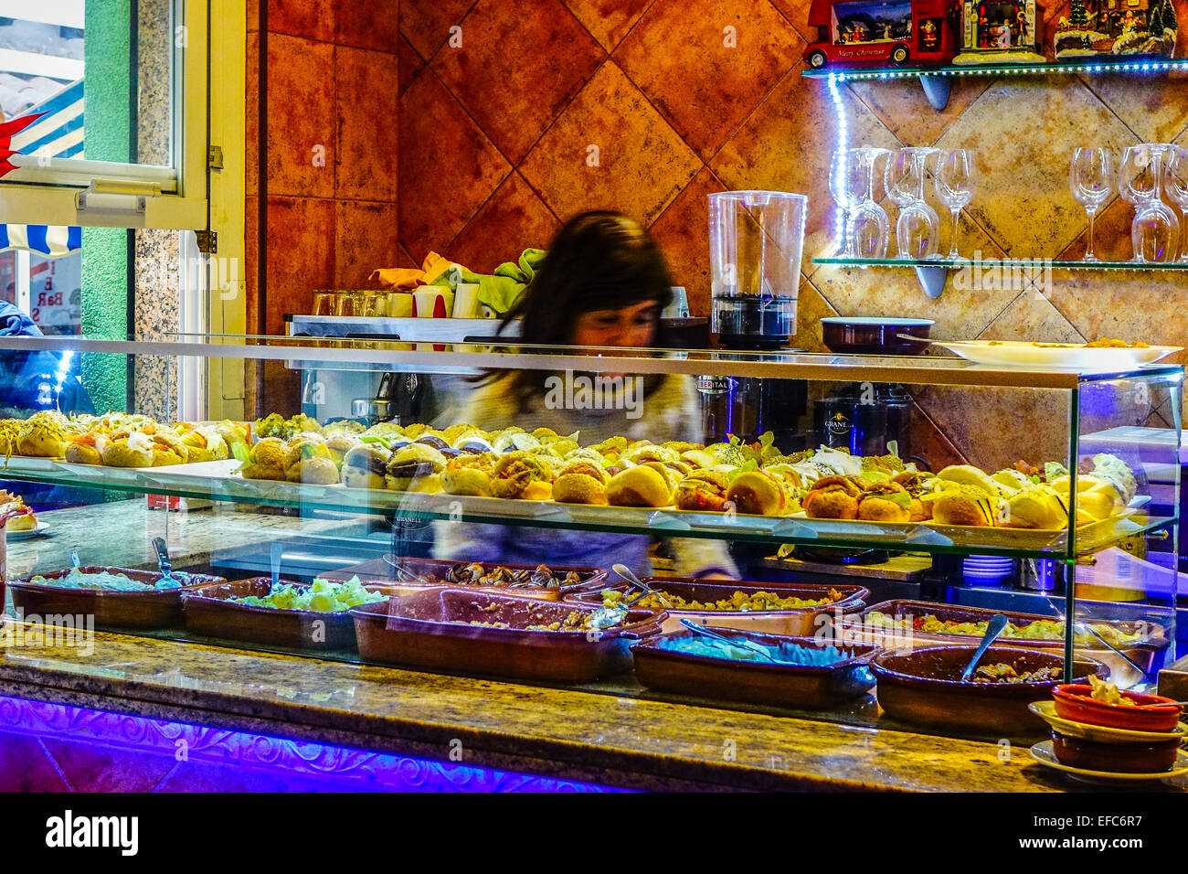 Tapas food in glass display cabinet in bar, Benidorm, Costa Blanca ...