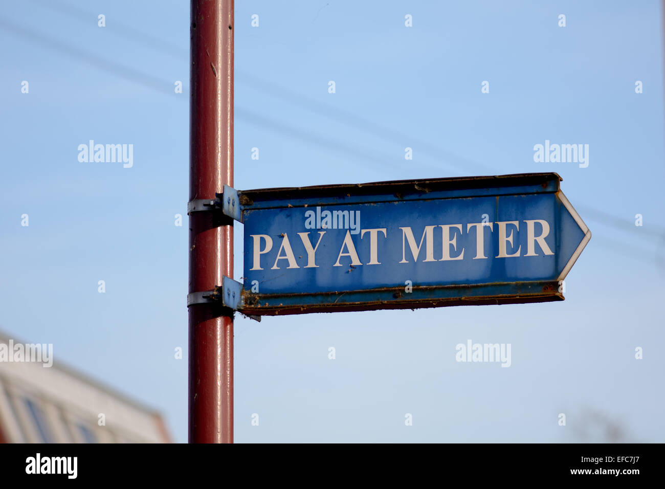 Pay at meter sign in car park Stock Photo - Alamy