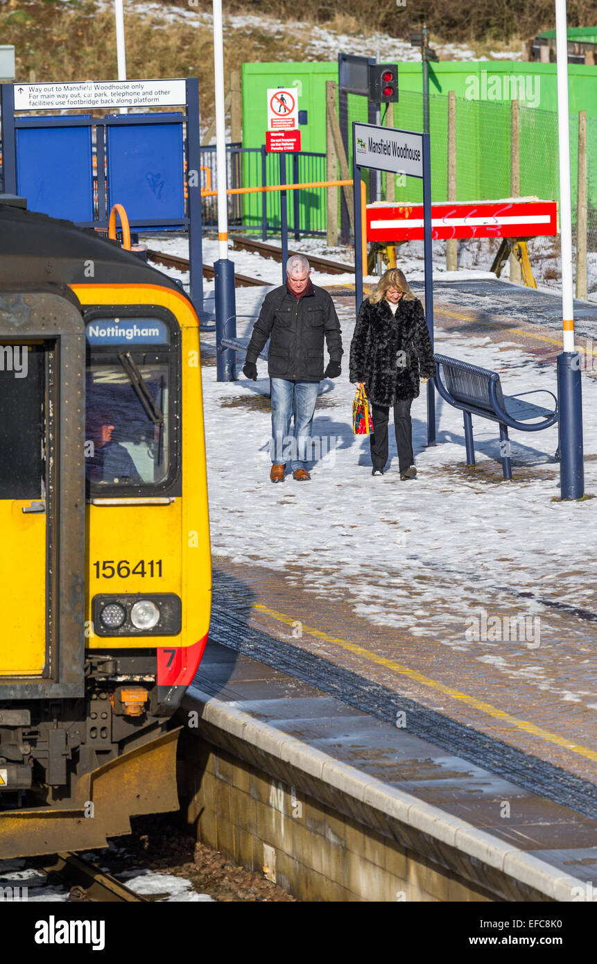 Woman train platform snow hi-res stock photography and images - Alamy