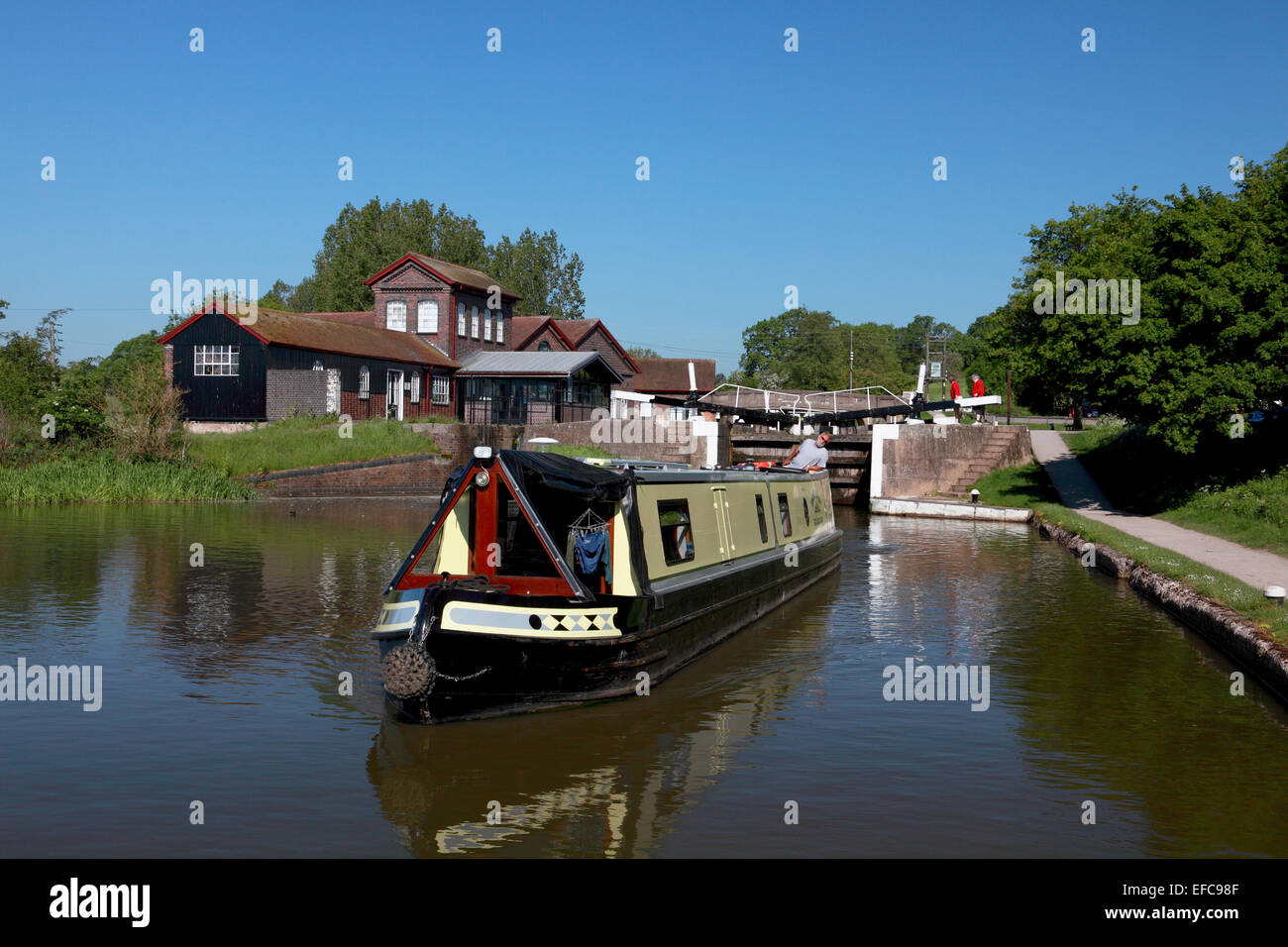 A narrowboat leaving Lock 41 of the Hatton flight of locks on the Grand ...