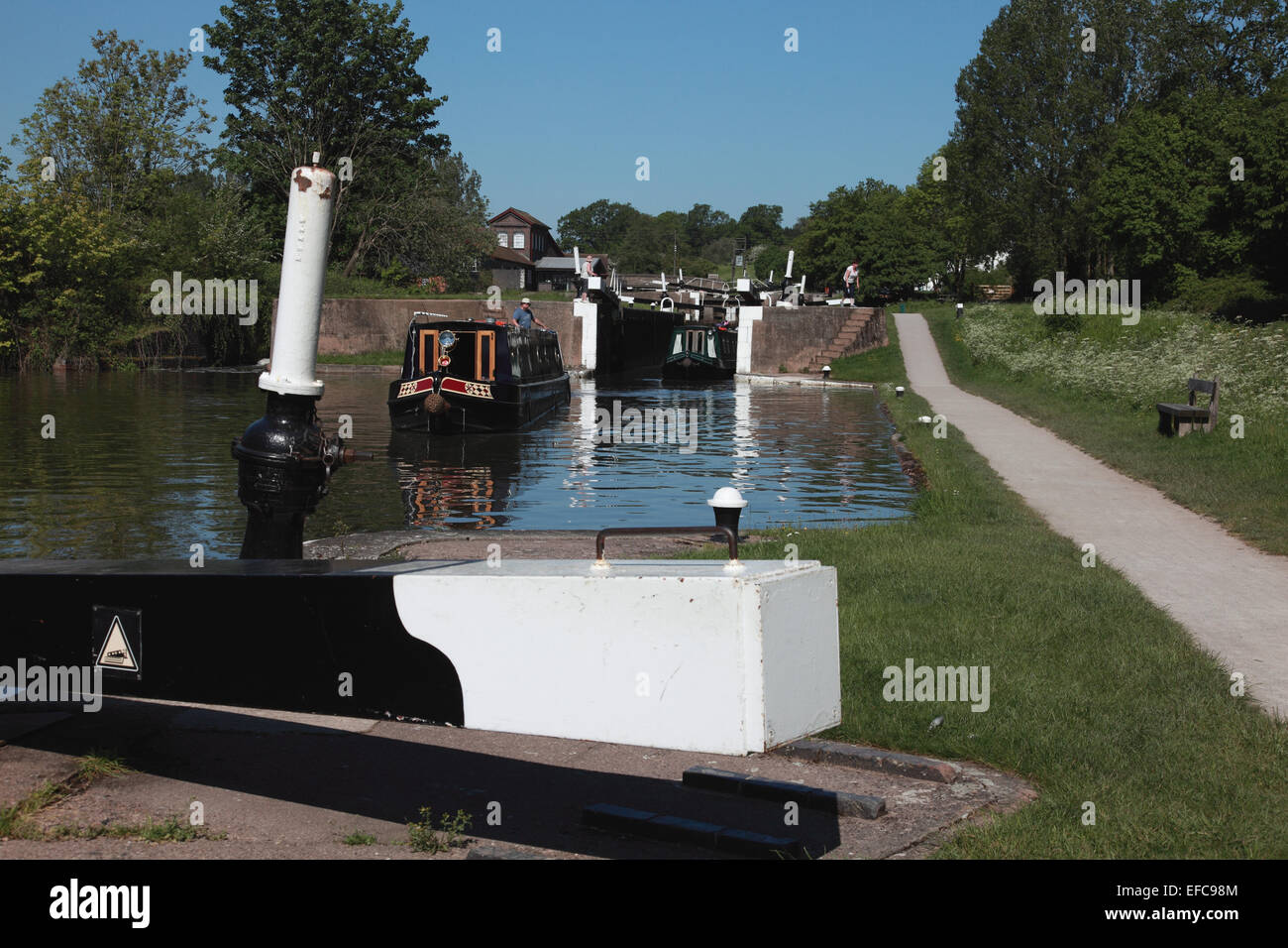 A narrowboat leaving Lock 41 of the Hatton flight of locks on the Grand ...
