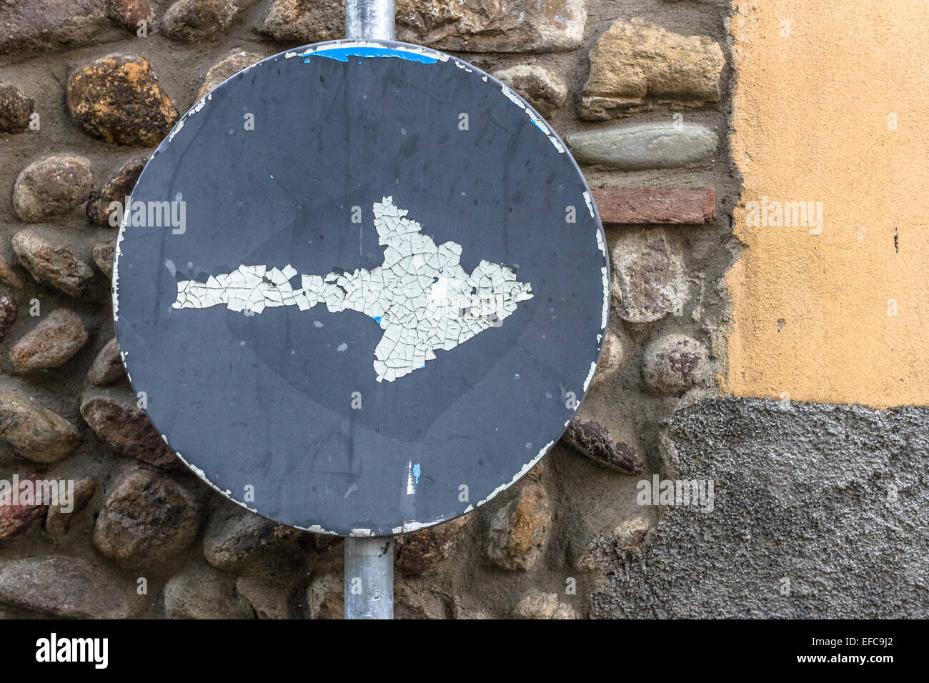 An old direction signal ravaged by time Stock Photo - Alamy