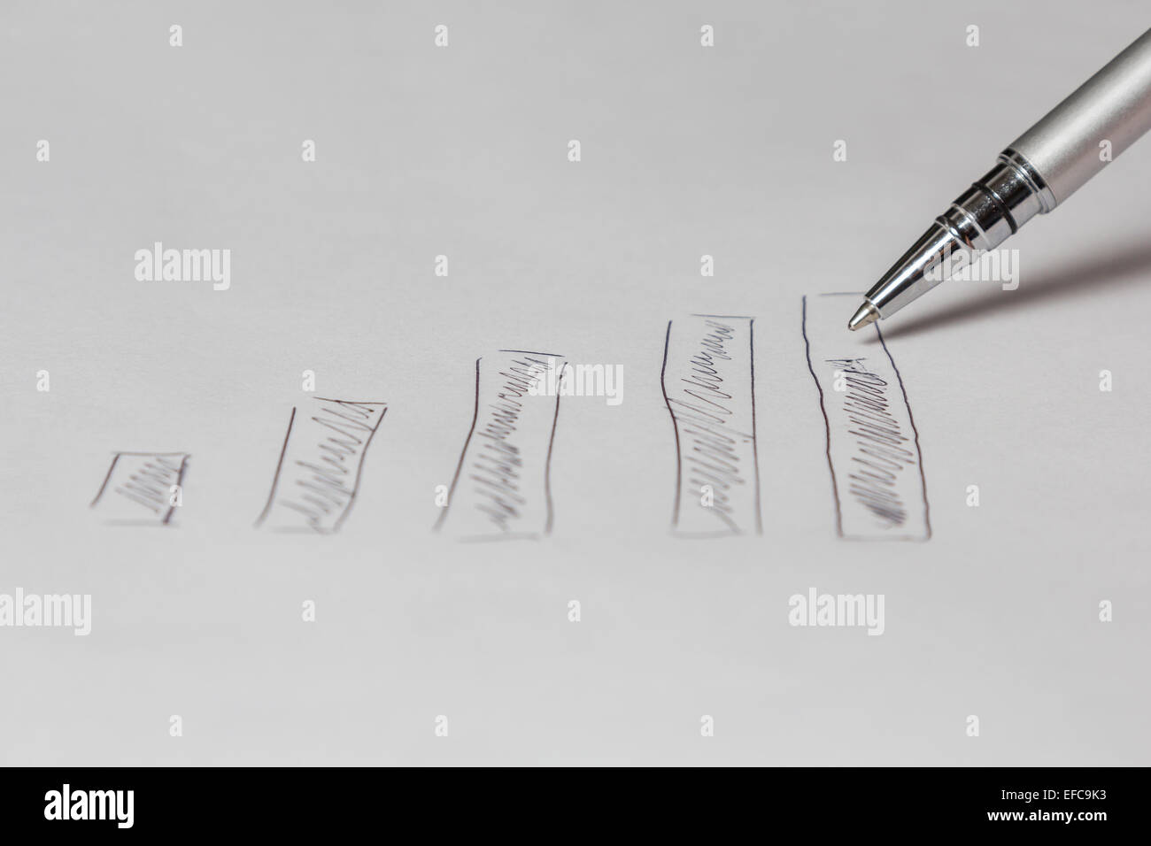 Silver pen drawing a diagram on a white sheet Stock Photo - Alamy