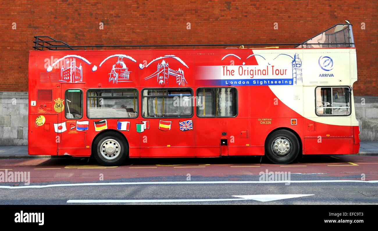 LONDON, UK - JULY 9, 2014: Traditional red double-decker tour bus is ...