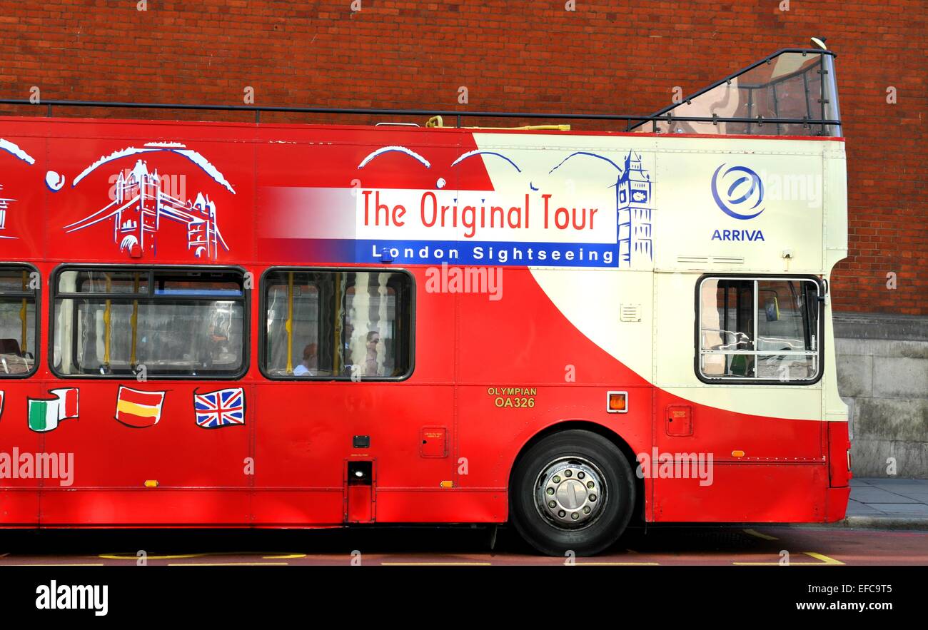 LONDON, UK - JULY 9, 2014: Traditional red double-decker tour bus is ...