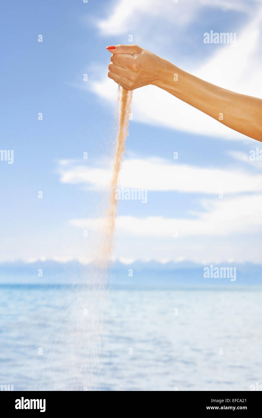 Hand Pouring Sand High Resolution Stock Photography and Images - Alamy