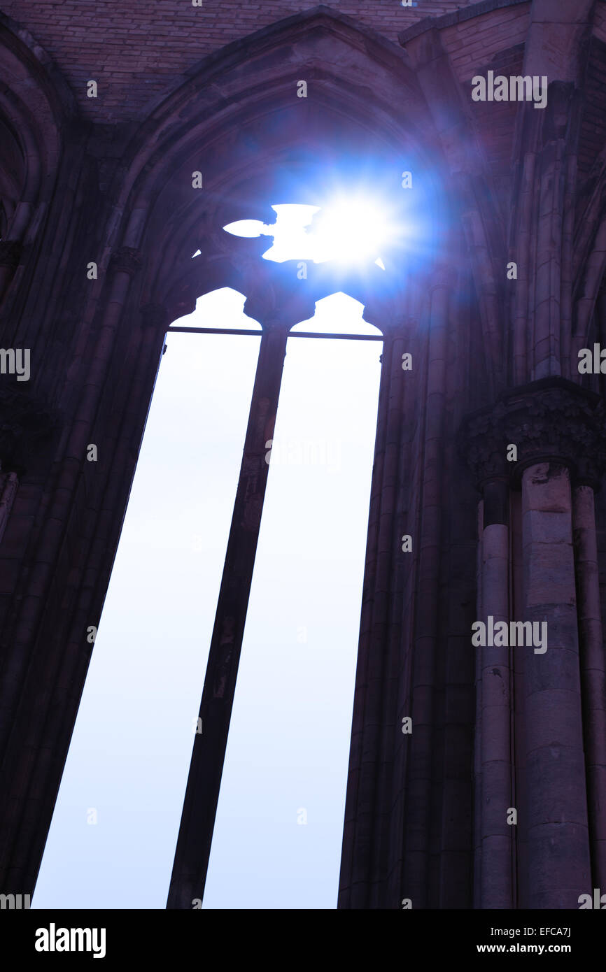 Window of a church and sunlight. Toned in blue color Stock Photo - Alamy