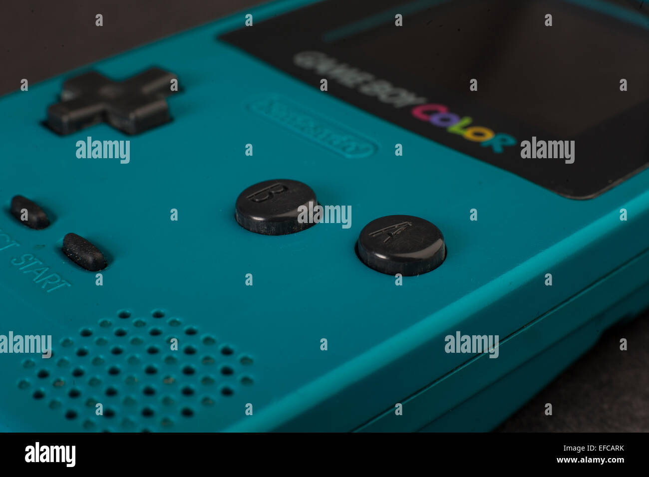 An old turquoise Gameboy color handhold console Stock Photo - Alamy