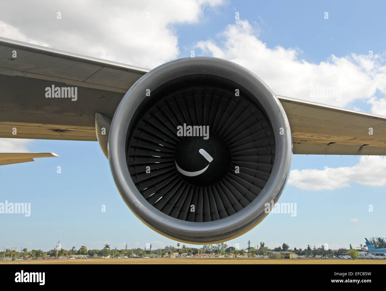 Jet airplane wing and engine front view Stock Photo - Alamy