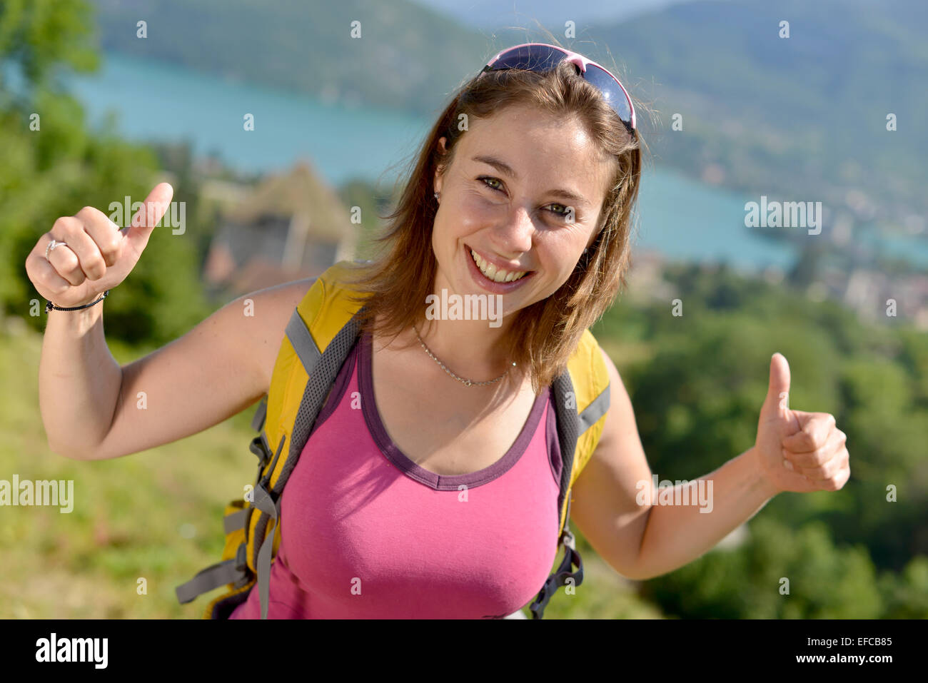 pretty young woman is hiking in the French Alps Stock Photo - Alamy