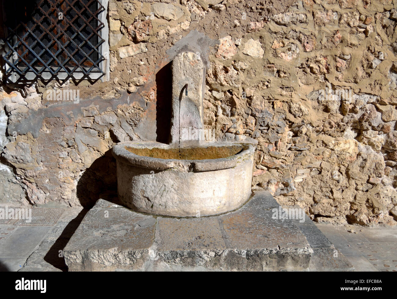 Old drinking water source in Cuenca Spain Stock Photo - Alamy