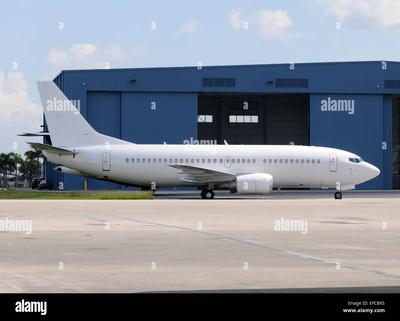 Passenger jet airplane in unmarked white color Stock Photo - Alamy