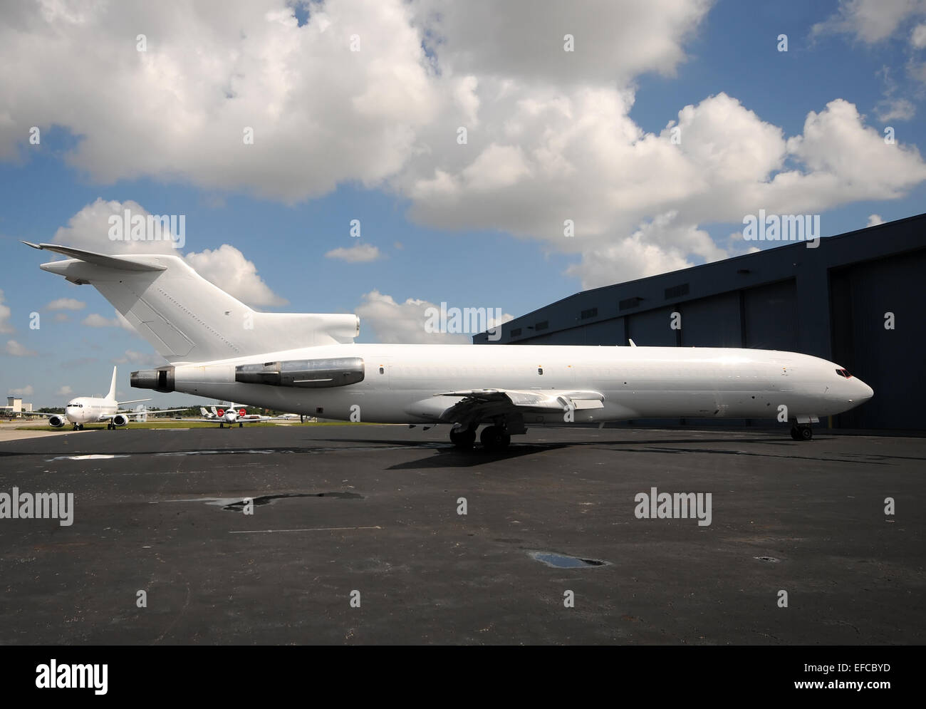 White cargo jet airplane in front of hangar Boeing 727 Stock Photo - Alamy