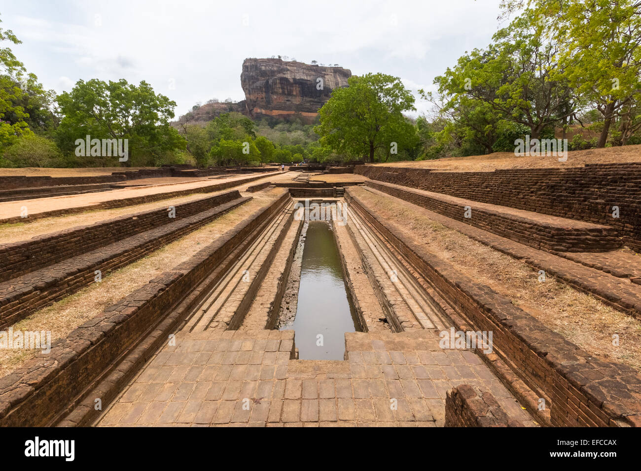 Ancient water channel in direction of the majestic Sigiriya rock, the ...