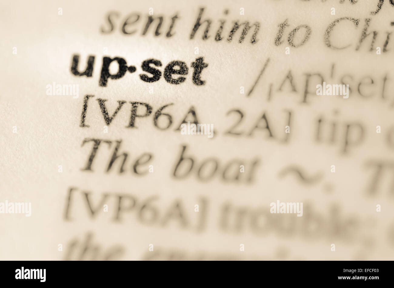 Definition of word upset in dictionary Stock Photo - Alamy