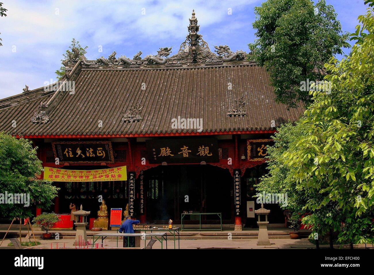 Chengdu, China: Prayer pavilion with dragon figures and ornate pinnacle ...