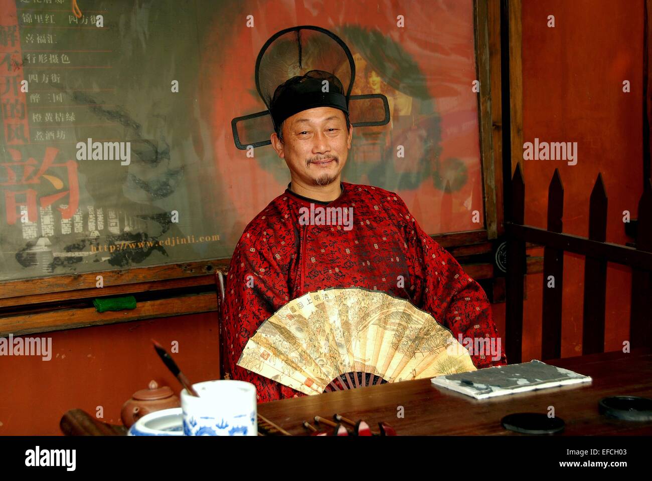 Chengdu, China: Actor dressed in traditional Mandarin robe with fan ...