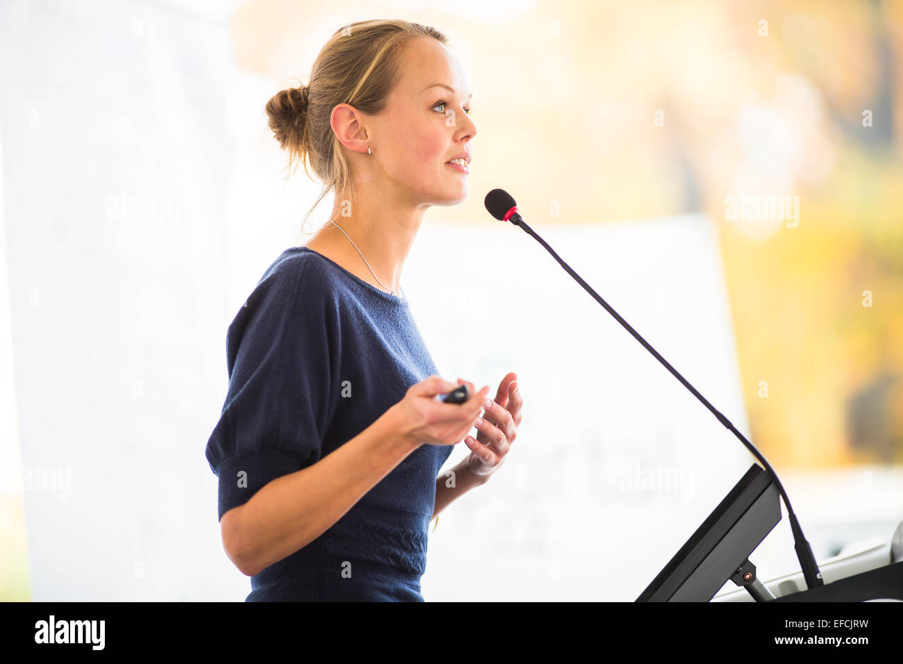 Young woman giving a speech hi-res stock photography and images - Alamy
