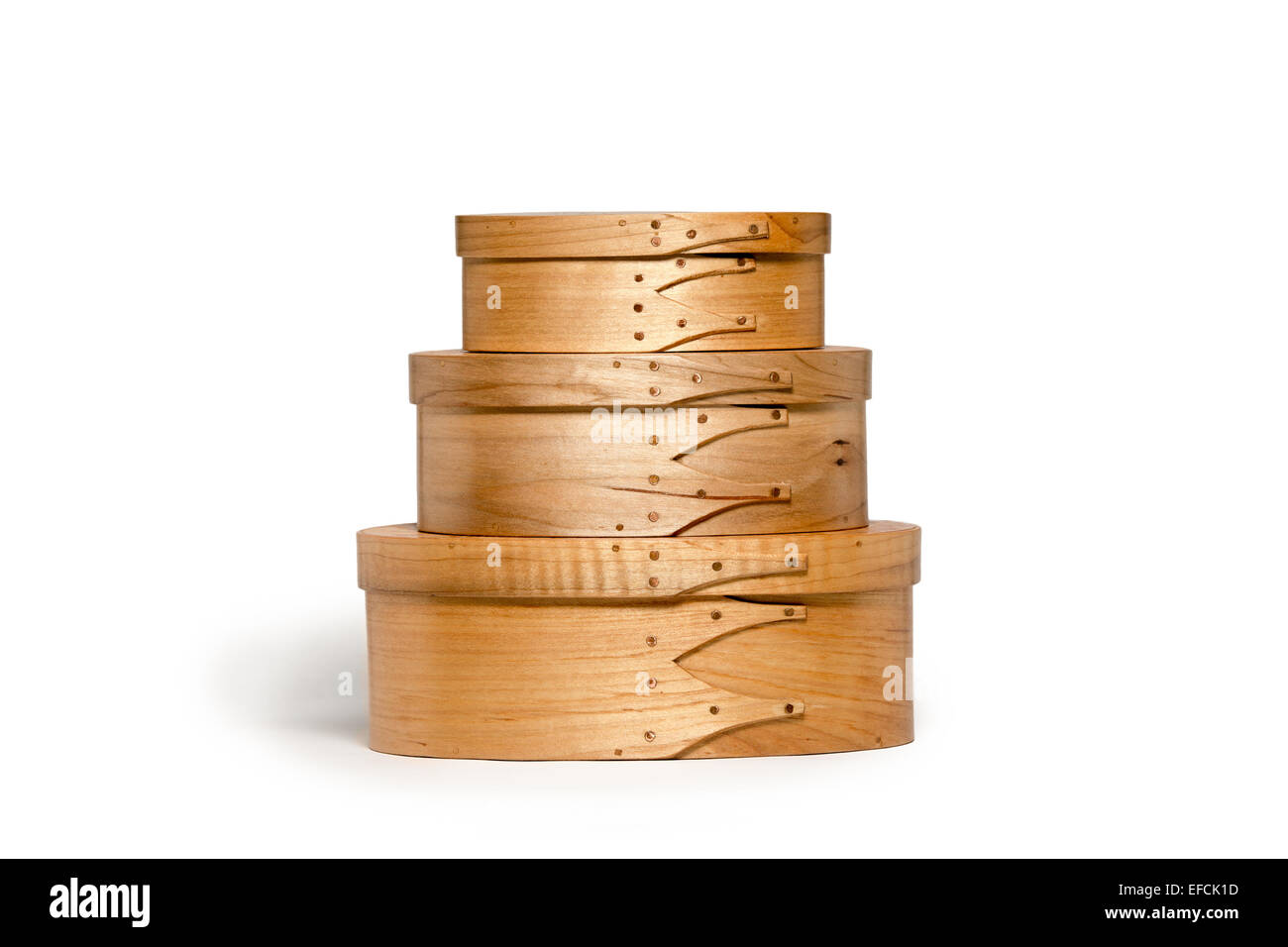 Collection of three hand-crafted shaker boxes. Stacked and isolated on ...