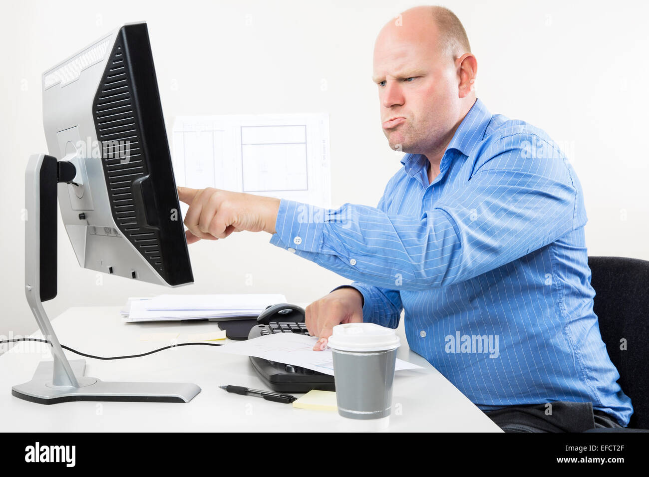 Hard working businessman at the office Stock Photo - Alamy