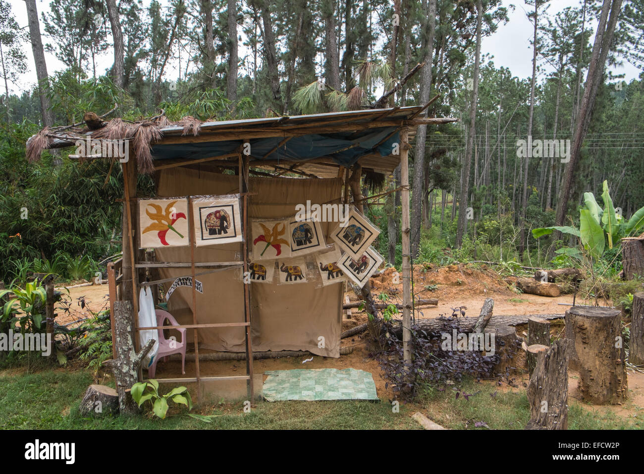 Small simple rustic stall shop selling art work drawings to tourists on ...