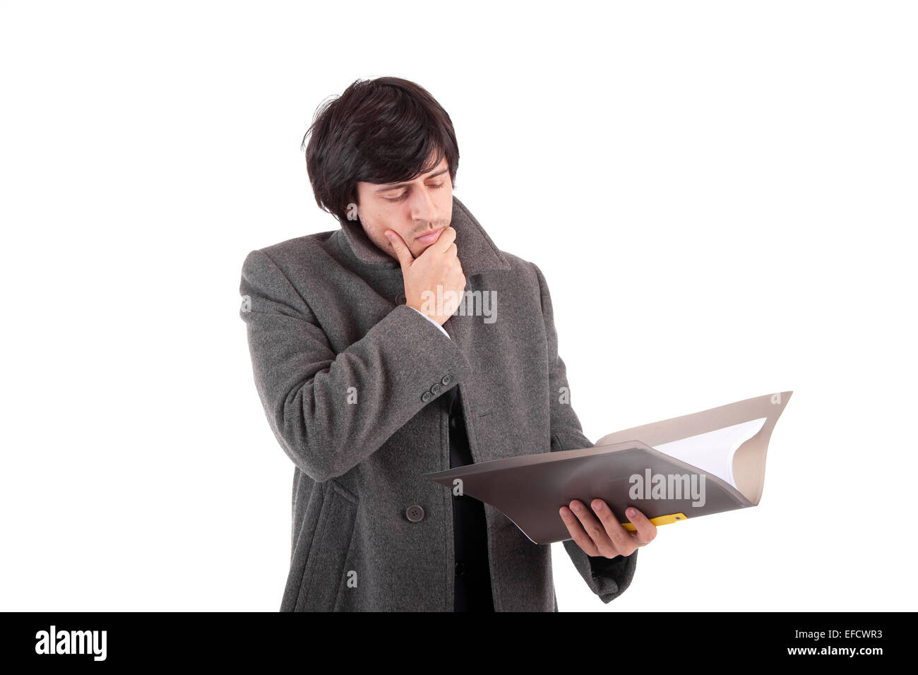Engineer reading plan, isolated over white background Stock Photo - Alamy