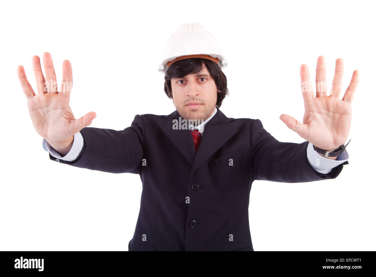 Engineer with white hat making stop sign - focus on hands Stock Photo ...