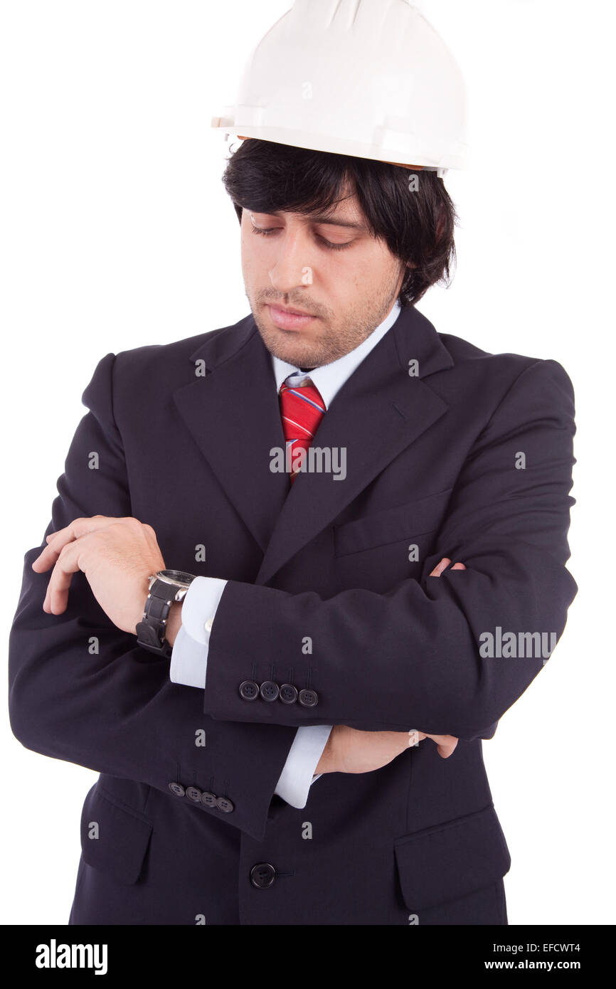 Young Engineer consulting his watch, isolated over white Stock Photo ...
