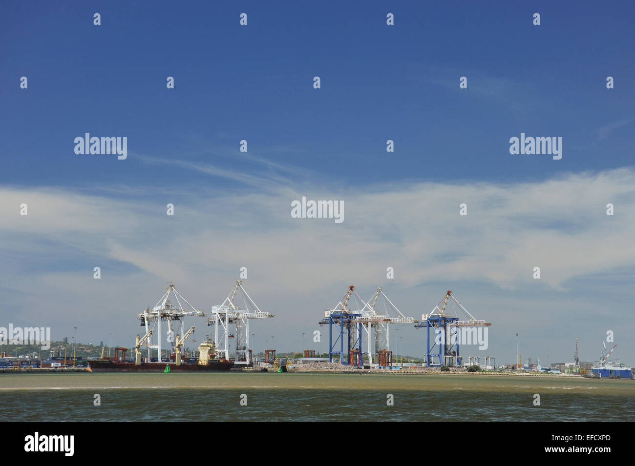 Durban, KwaZulu-Natal, South Africa, harbour scene of cranes and ...